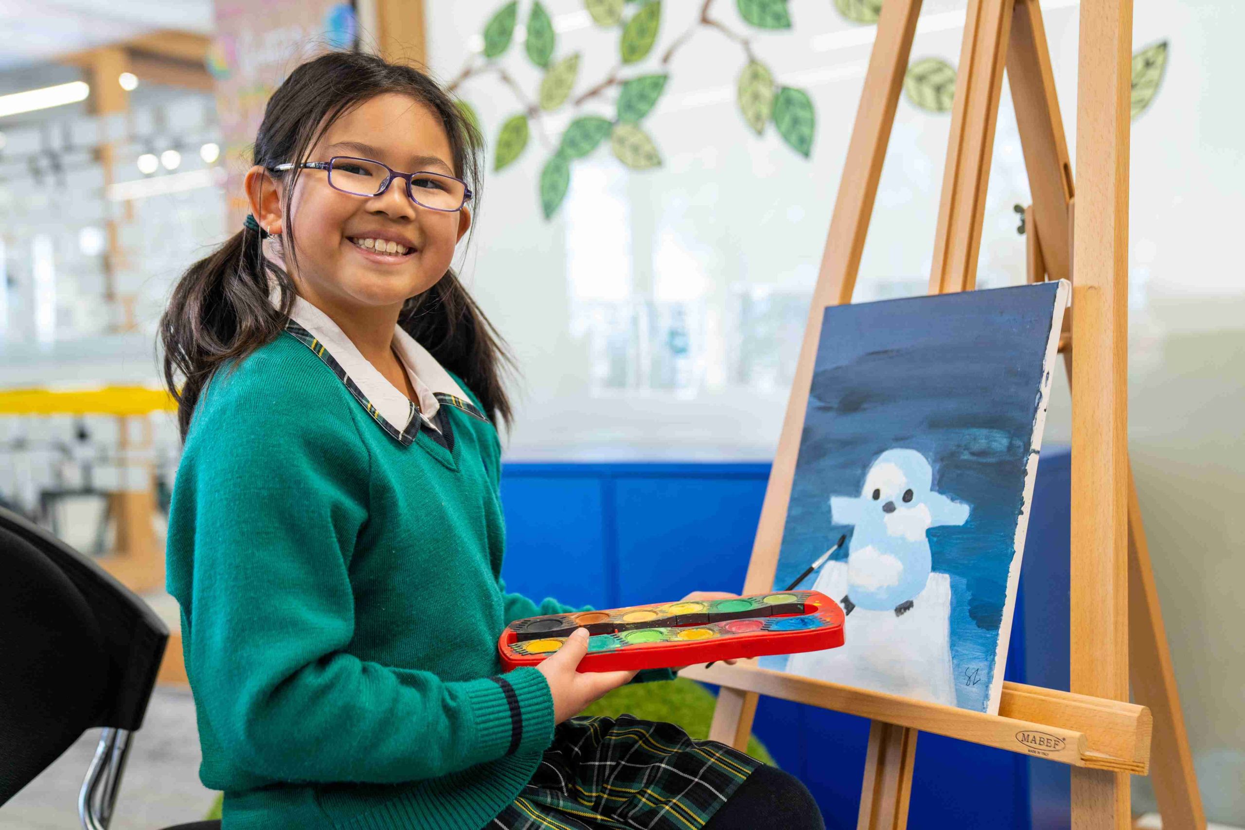 A photo showing a student artist painting | St Martha's Catholic ...